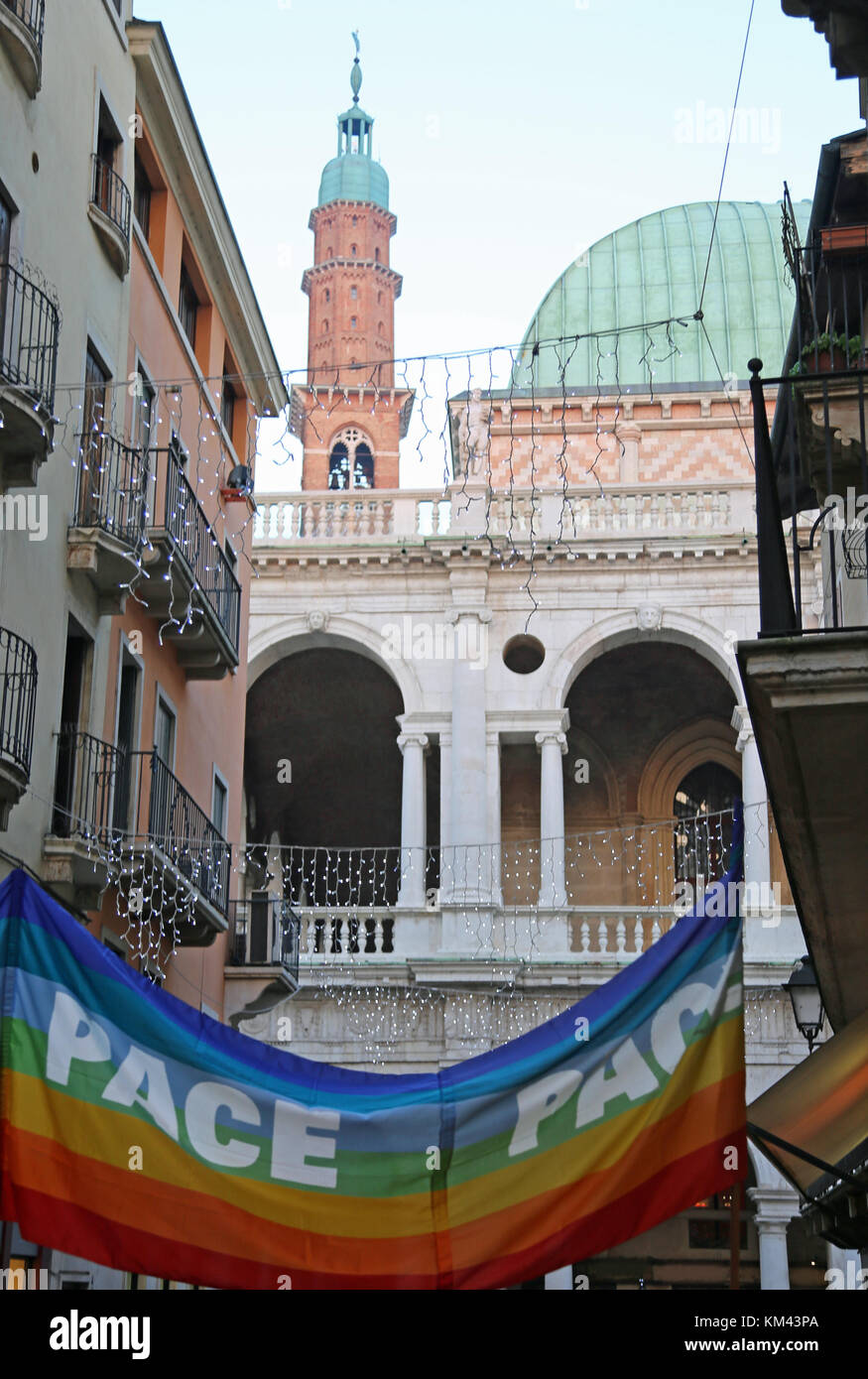 big multicolor flag with text PACE that means Peace in italian language ...