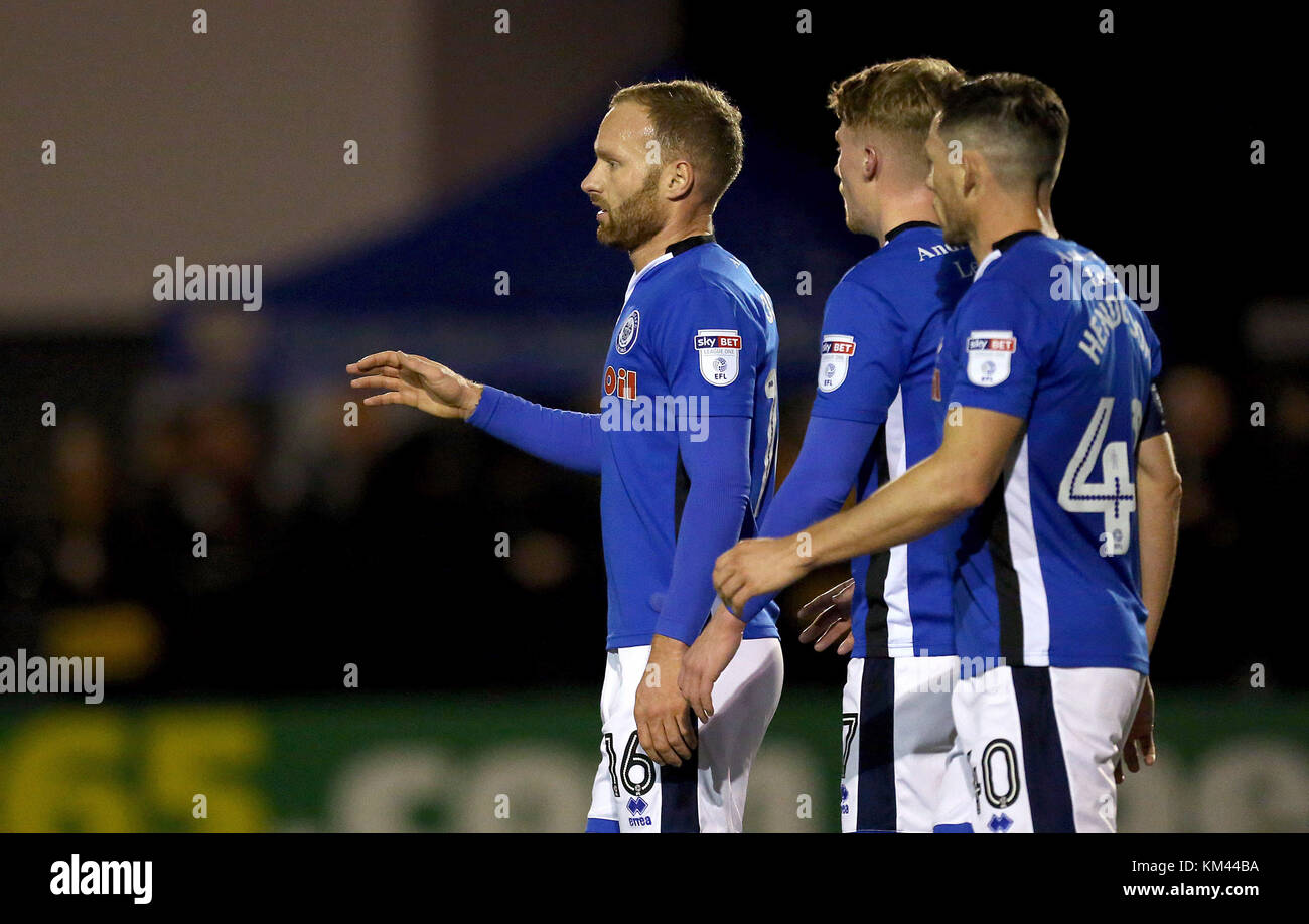 Rochdale Matt Done (left) celebrates scoring his side's fourth goal of ...