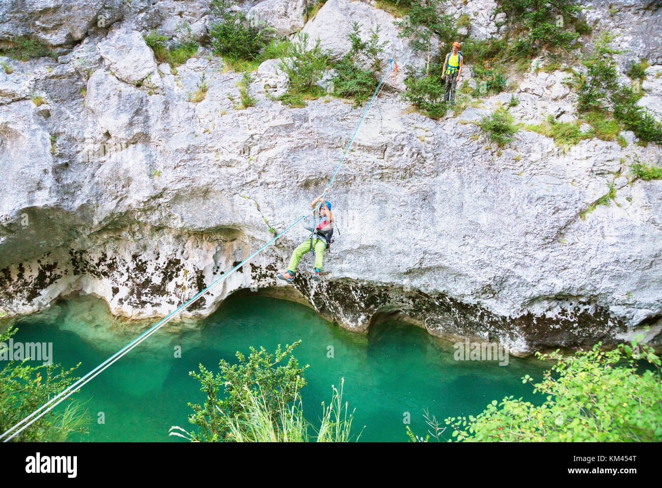 Man crossing the Verdon Gorge on a rope, Provence-Alpes-Cote d'Azur ...