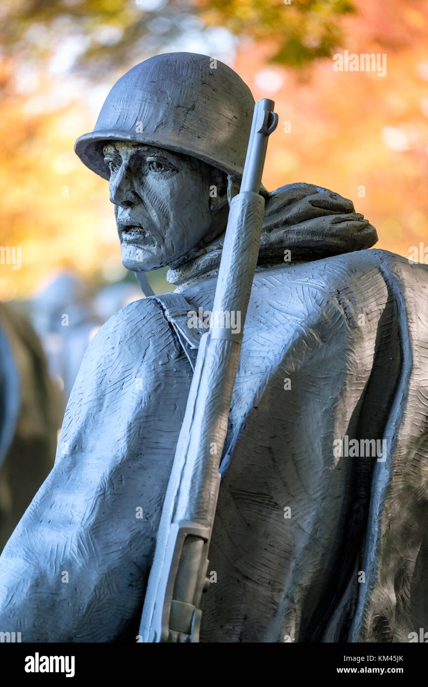 Detail of American soldier stainless steel statue wearing combat gear ...