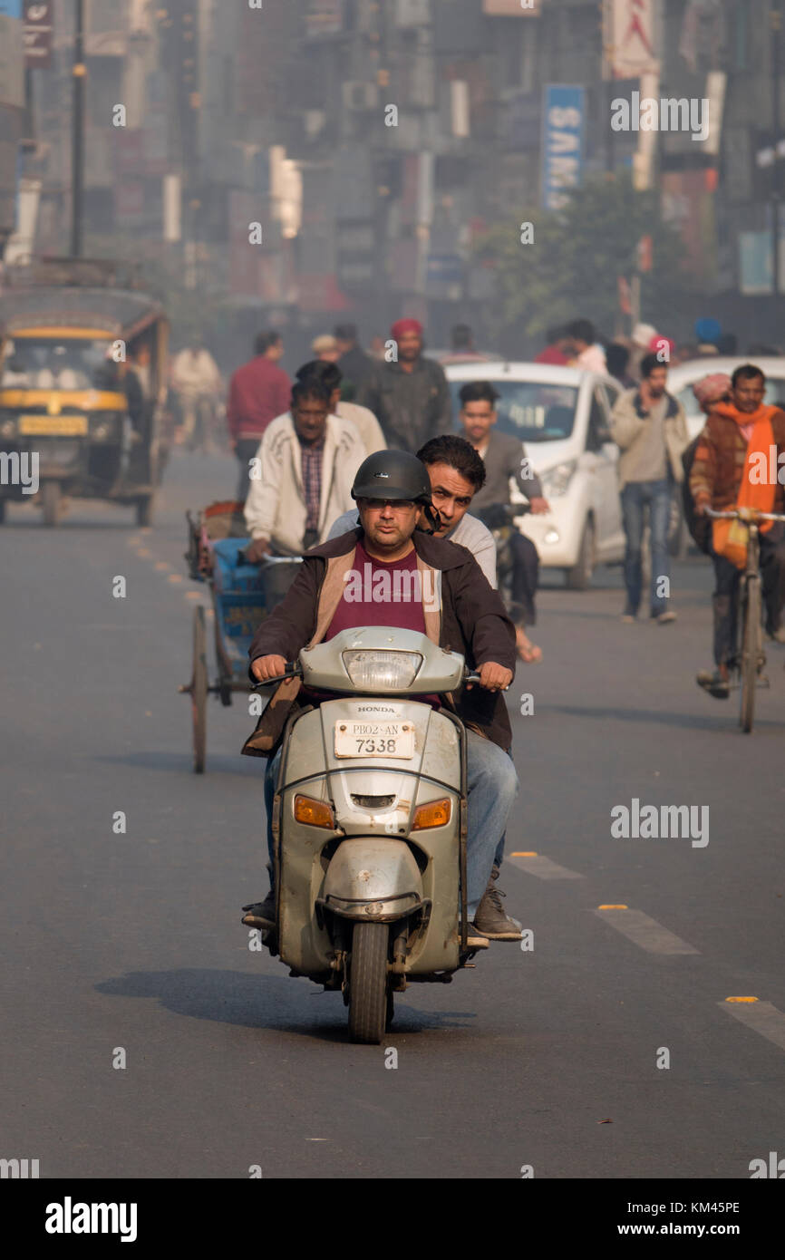 Men riding on scooter hi-res stock photography and images - Alamy