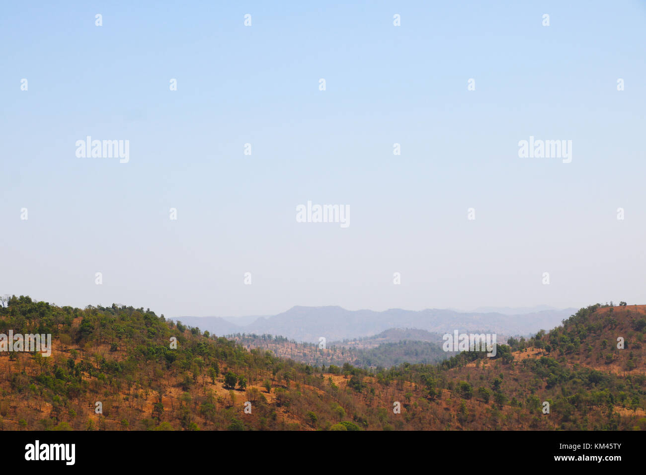 top view from hill with background hills hiding in cloud Stock Photo ...
