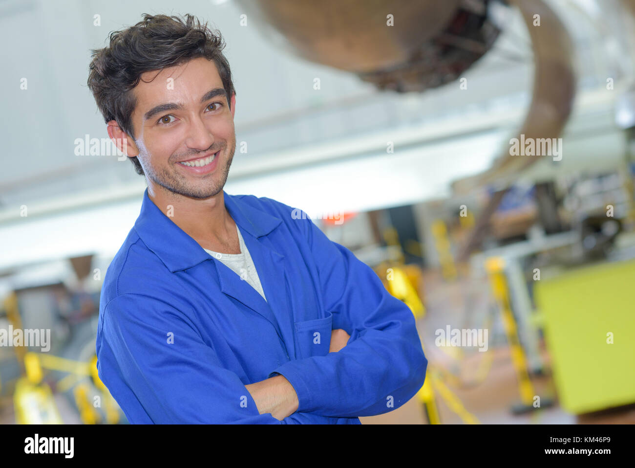 engineer posing in warehouse Stock Photo - Alamy