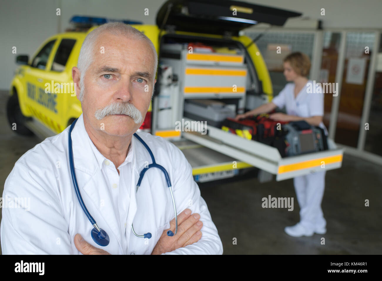 paramedic vehicle staff Stock Photo - Alamy