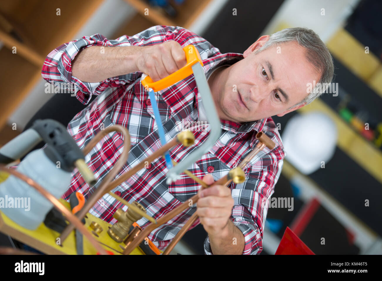 plumber man with tools Stock Photo - Alamy