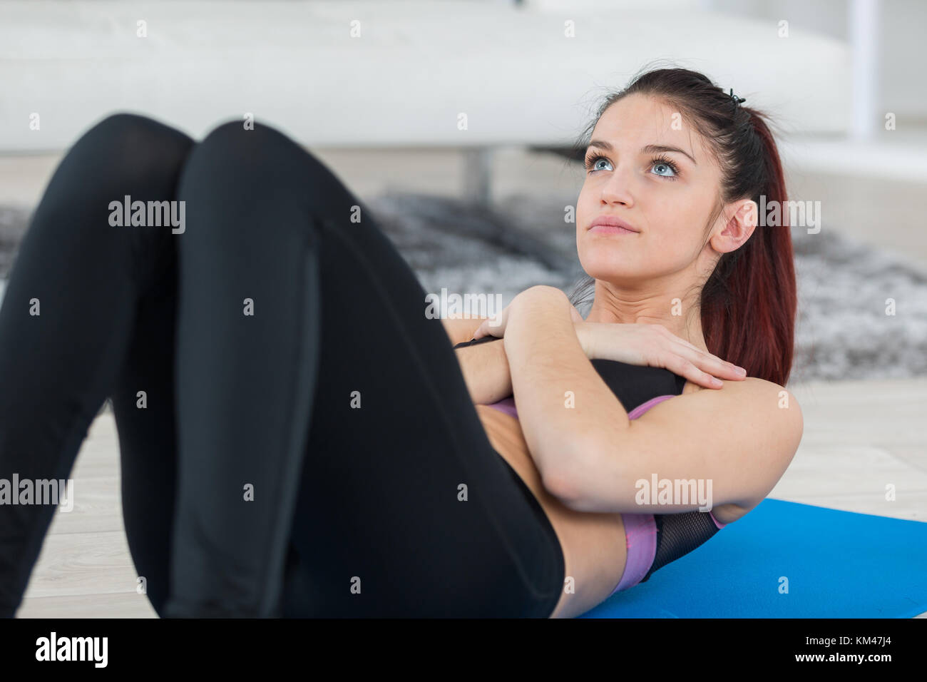 Lady in pilates posture Stock Photo - Alamy