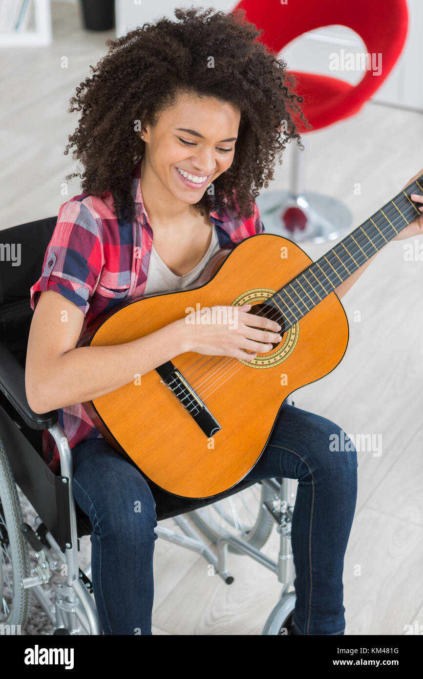 young female musician on wheelchair Stock Photo - Alamy