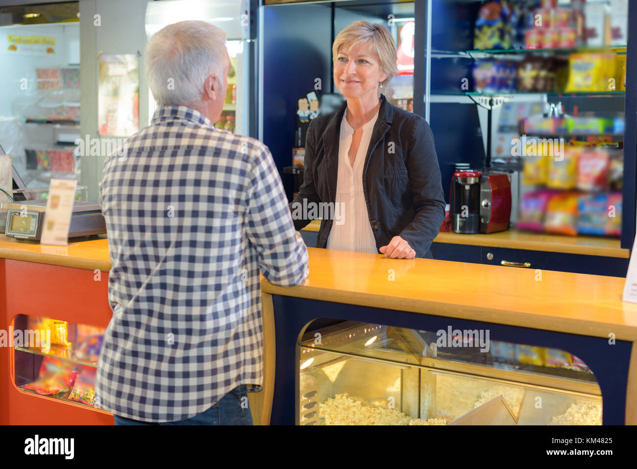 man ordering before entering Stock Photo - Alamy