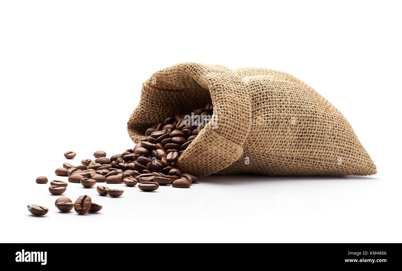 Coffee beans spilled out from burlap sack isolated on white background ...