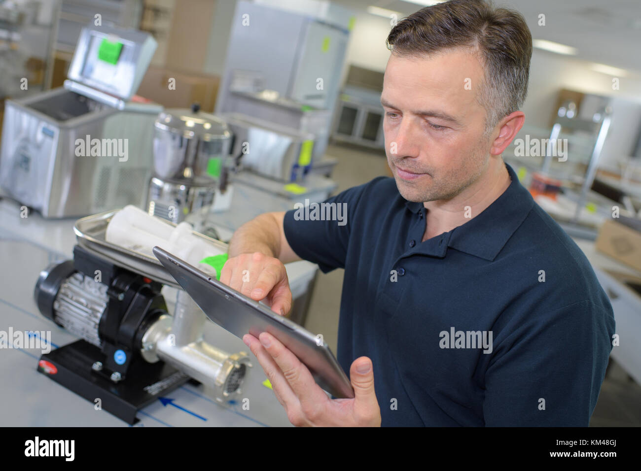 technician checking laptop Stock Photo - Alamy