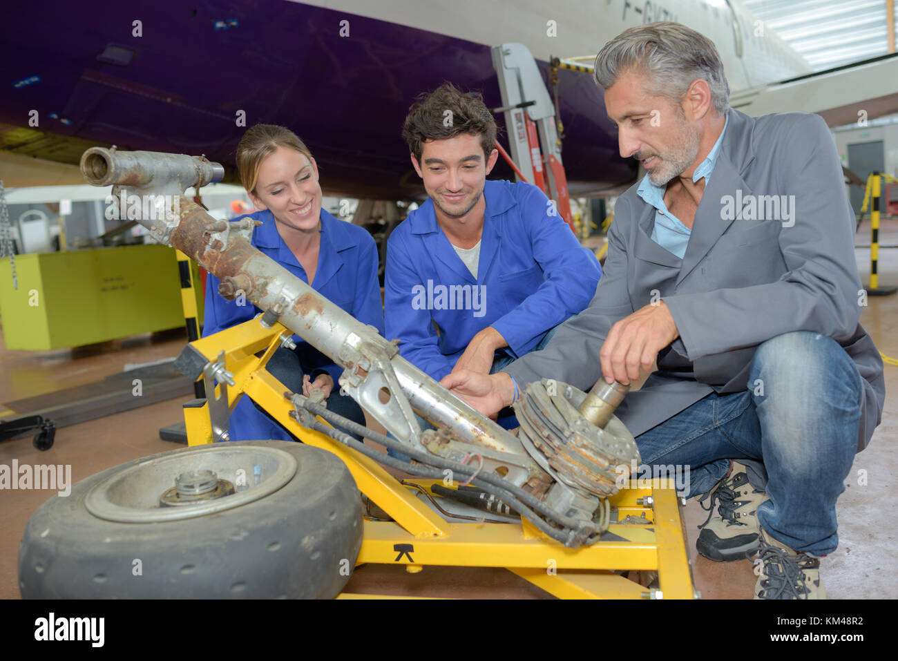 fixing a wheel Stock Photo - Alamy