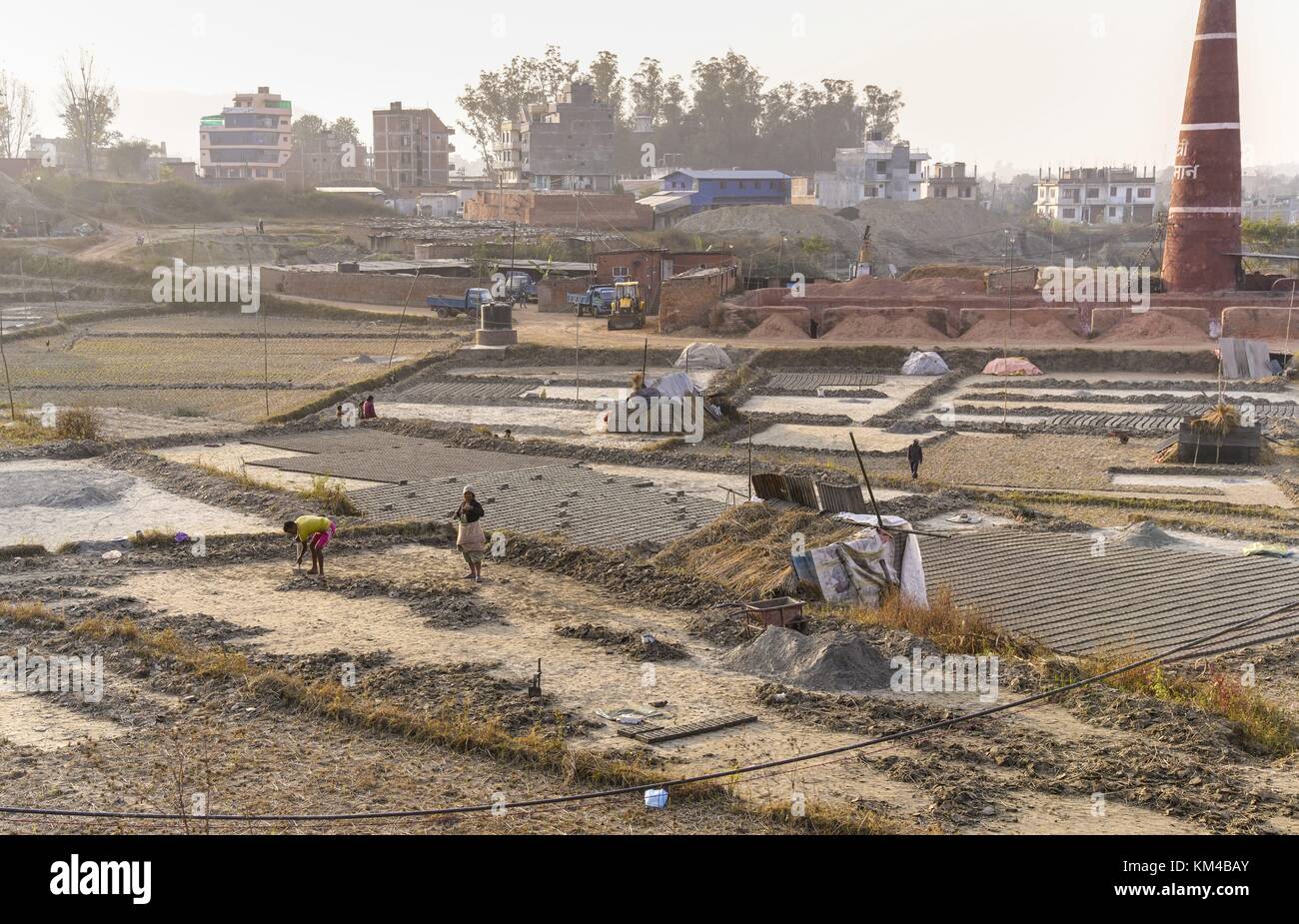 In heavy manual work brick stones are made in this brickyard near ...