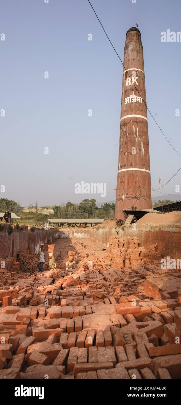 In heavy manual work brick stones are made in this brickyard near ...