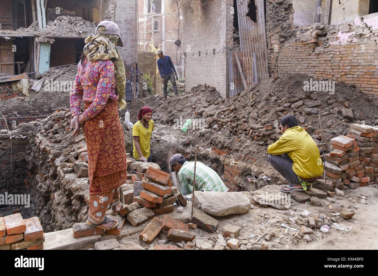 Workers are starting to rebuild a house that was destroyed in the 2015 ...