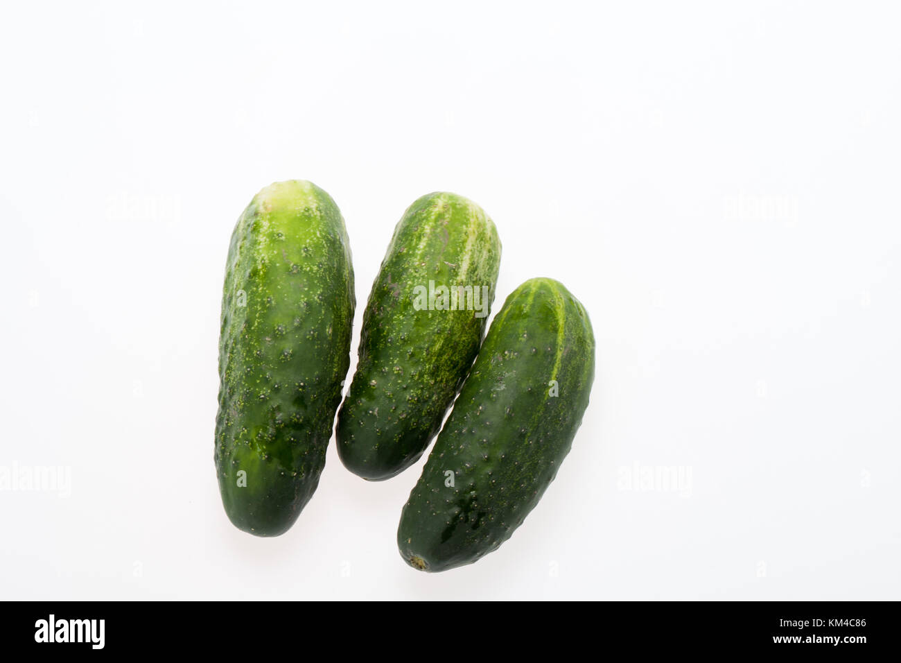 A fresh green cucumber isolated on a white background Stock Photo - Alamy