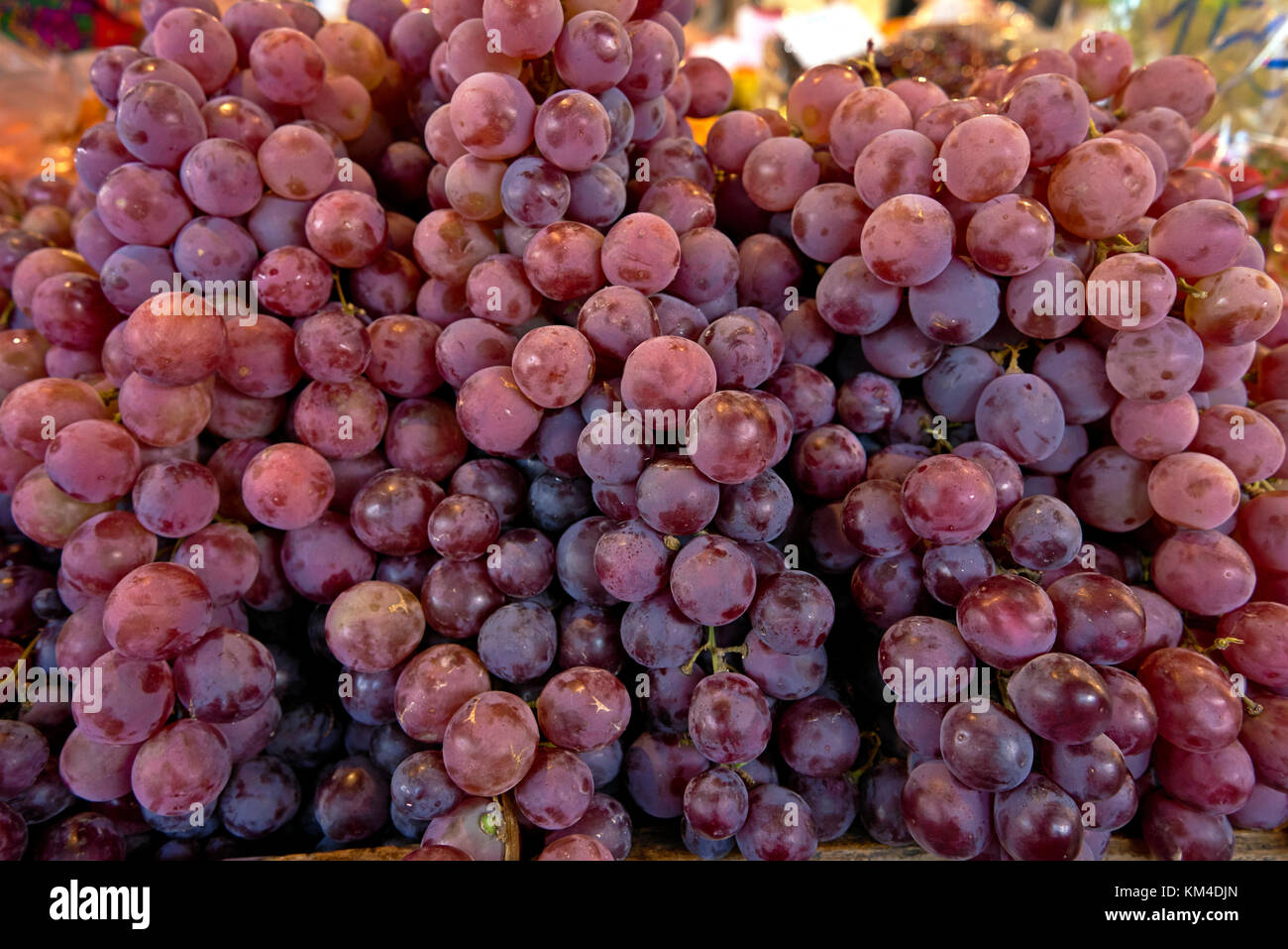Purple grapes for sale on a Thailand food market stall Stock Photo - Alamy
