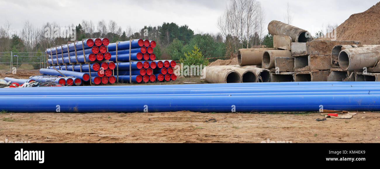 Long blue plastic pipes for the restoration of the old decayed sewage ...