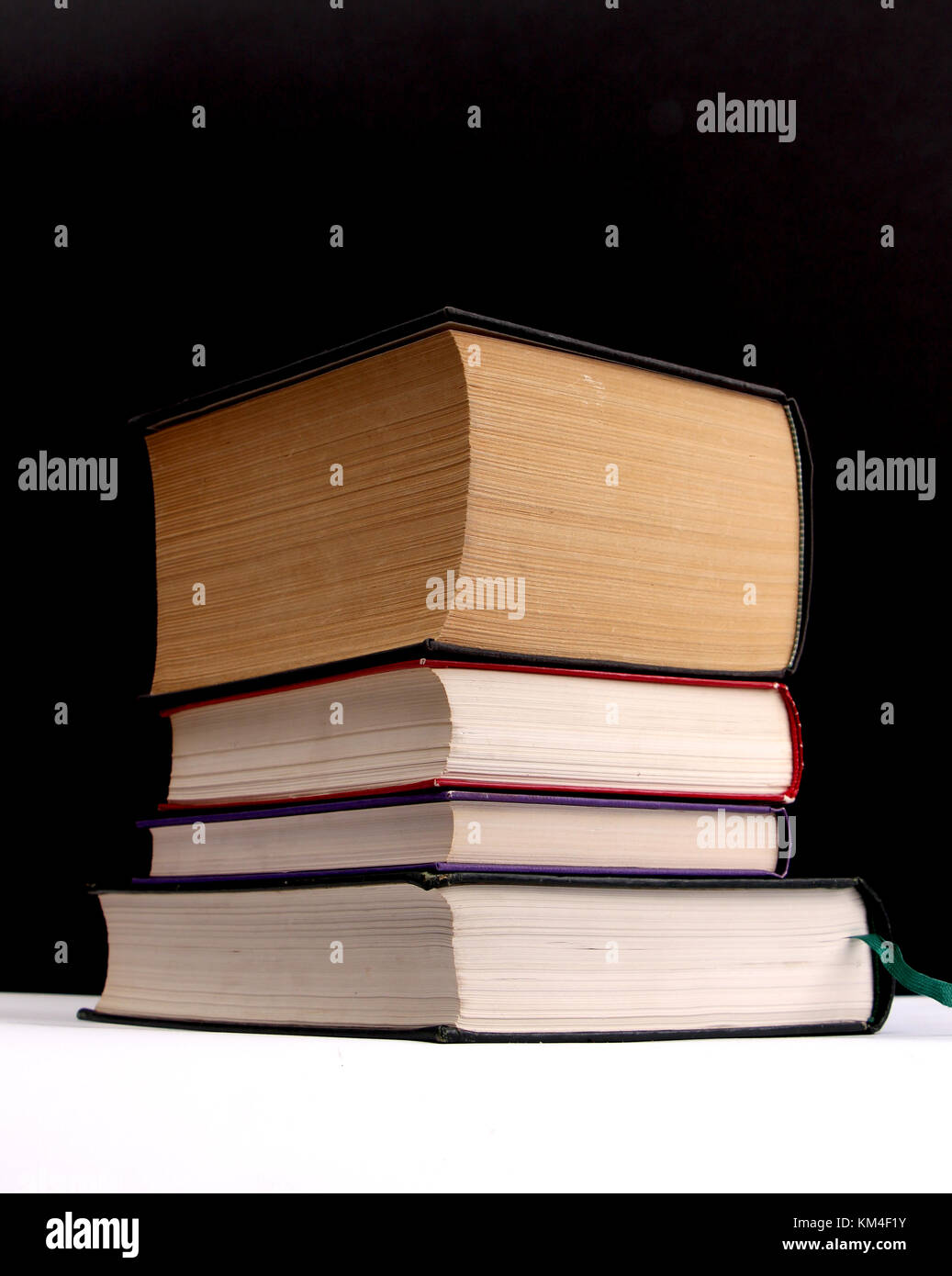 various colored books on a black and white background,image of a Stock ...