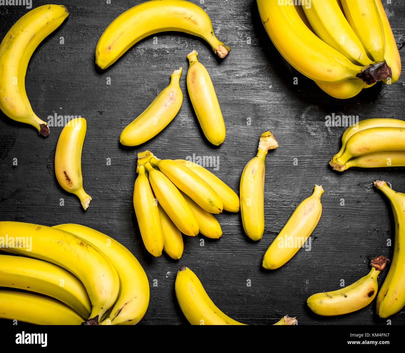 Ripe fresh bananas. On a black chalkboard Stock Photo - Alamy