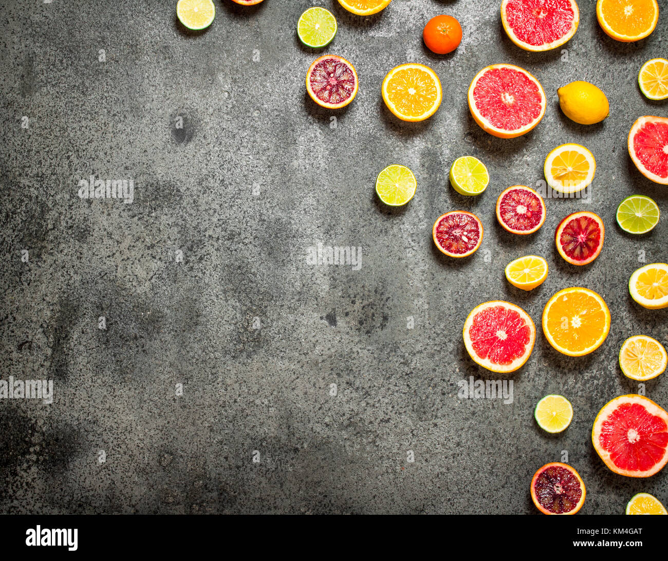 Citrus background. Fresh citrus fruit. On rustic background Stock Photo ...
