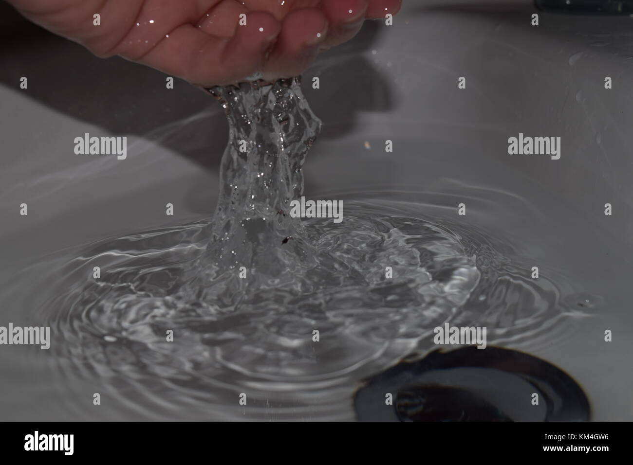 Hand running water hi-res stock photography and images - Alamy