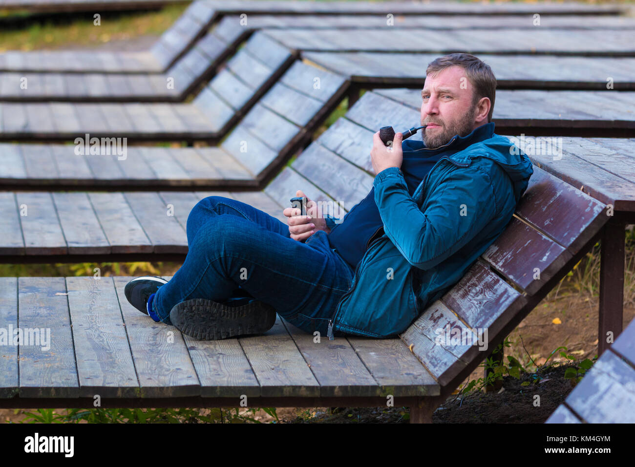 Retro man smoke pipe hi-res stock photography and images - Alamy