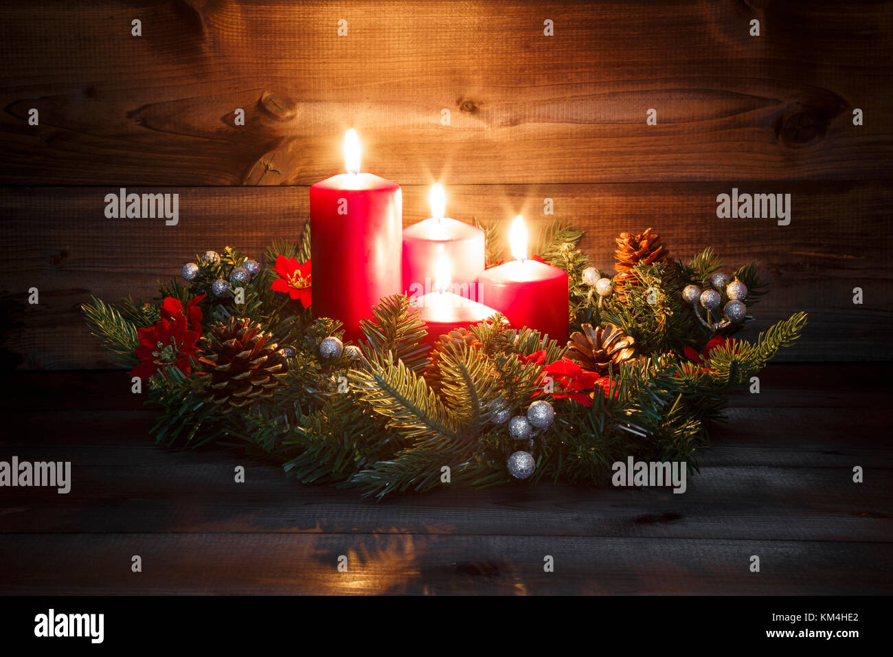 Fourth Advent - Decorated Advent wreath with four red burning candles ... Fourth Advent - Decorated Advent wreath with four red burning candles ...