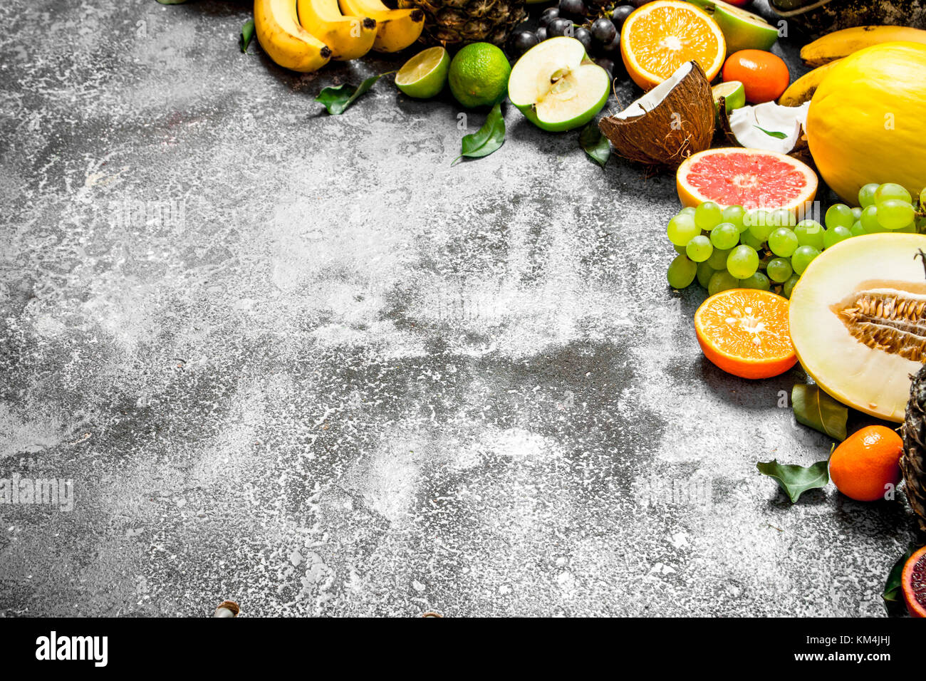 variety of fresh fruits. On rustic background Stock Photo - Alamy