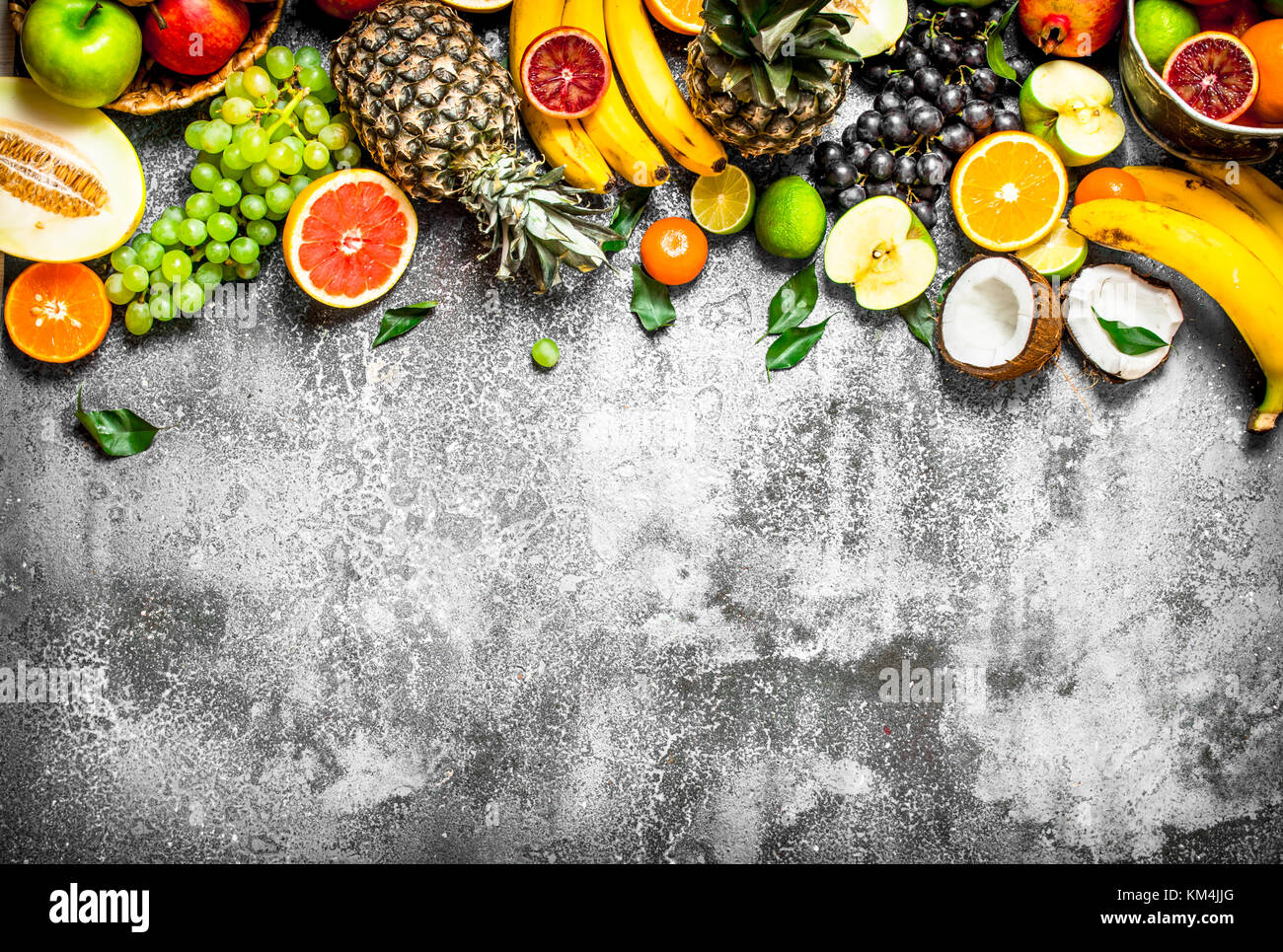 variety of fresh fruits. On rustic background Stock Photo - Alamy