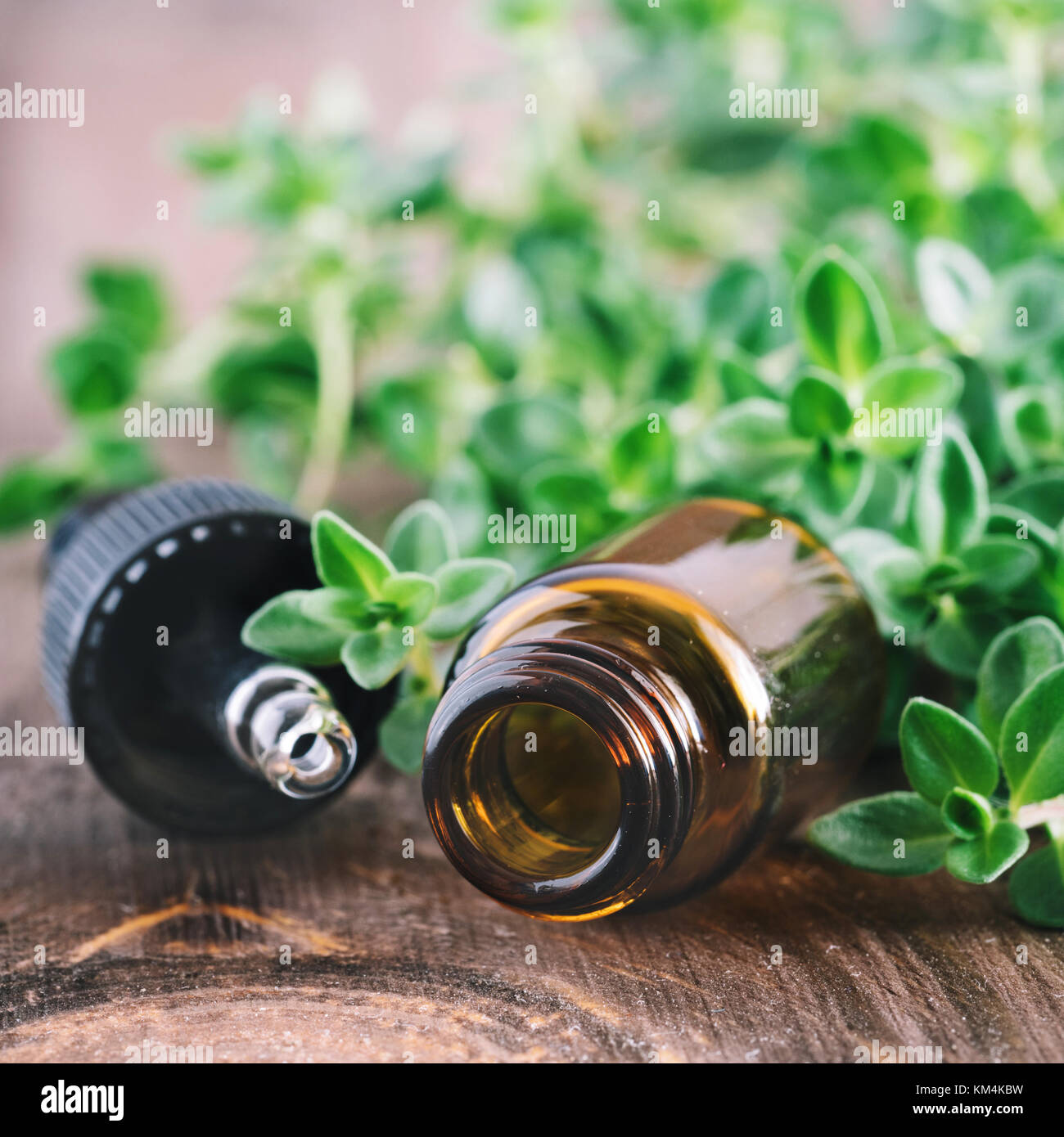 Organic essence green essential oil hi-res stock photography and images ...