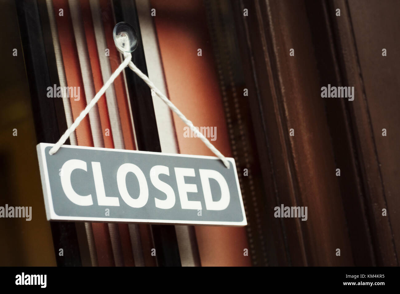 A shop doorway with a Closed sign Stock Photo - Alamy