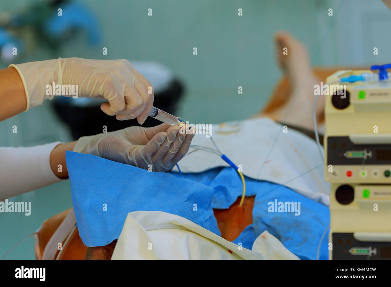 Nurses preparing patient before operation in hospital preparing a ...