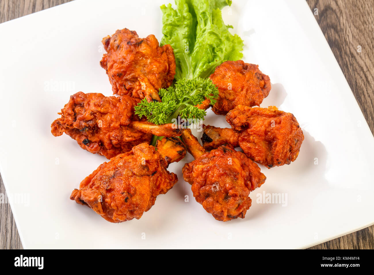 Indian traditional cuisine - Chicken lollipops with spices Stock Photo ...