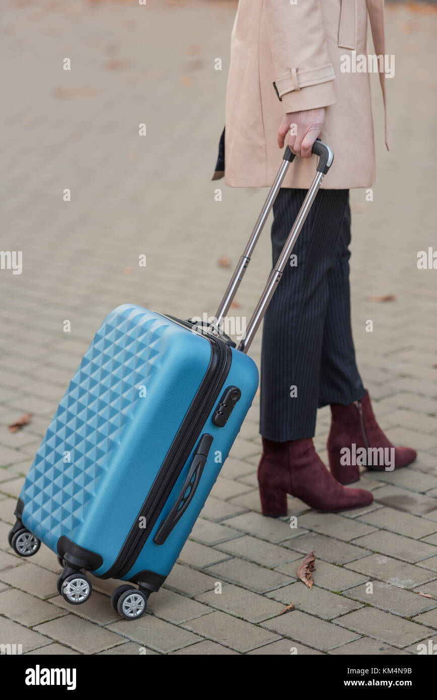 Person travelling suitcase hi-res stock photography and images - Alamy