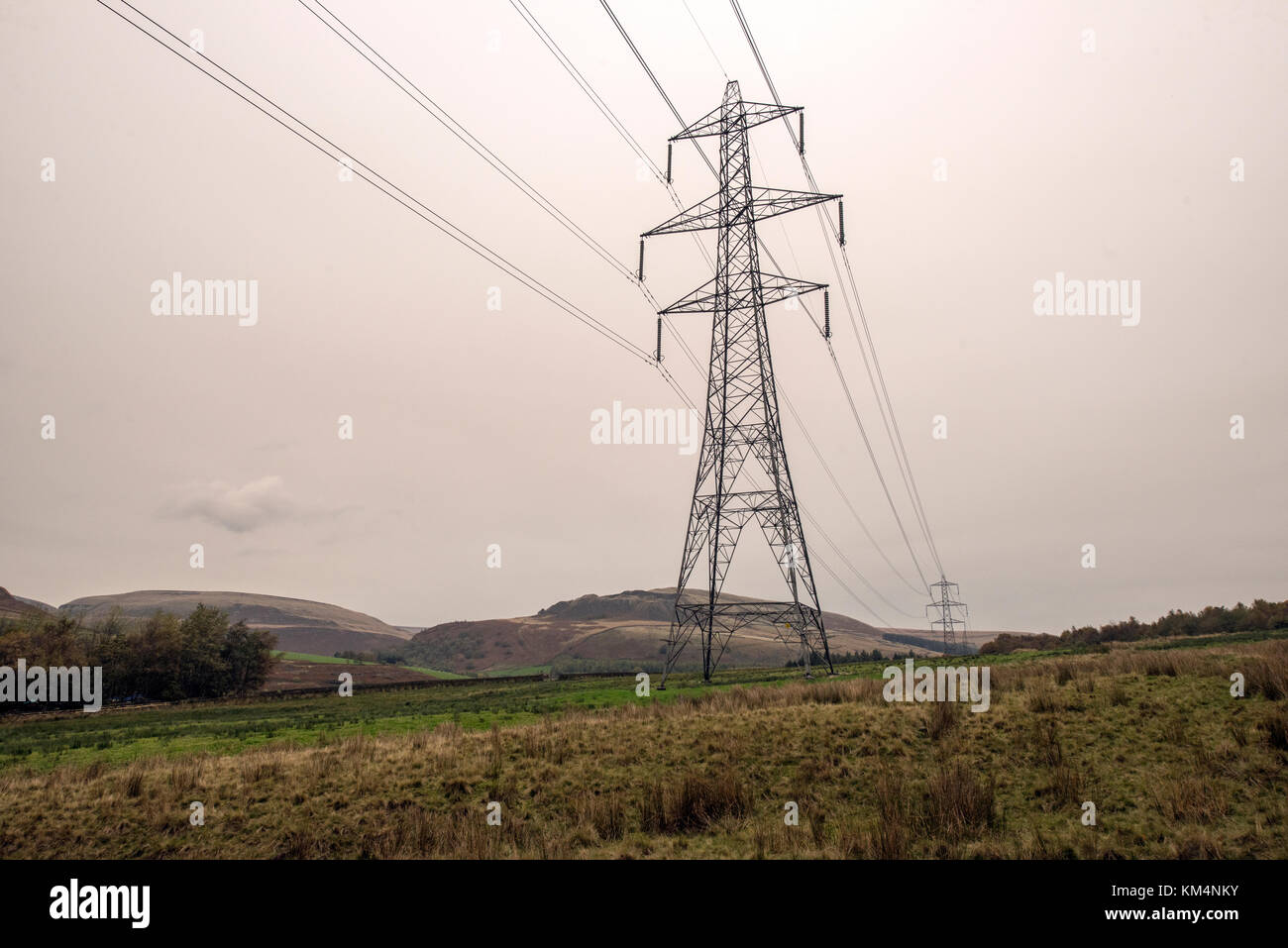 Pylons in the English Landscape on a Sunny Day Stock Photo - Alamy