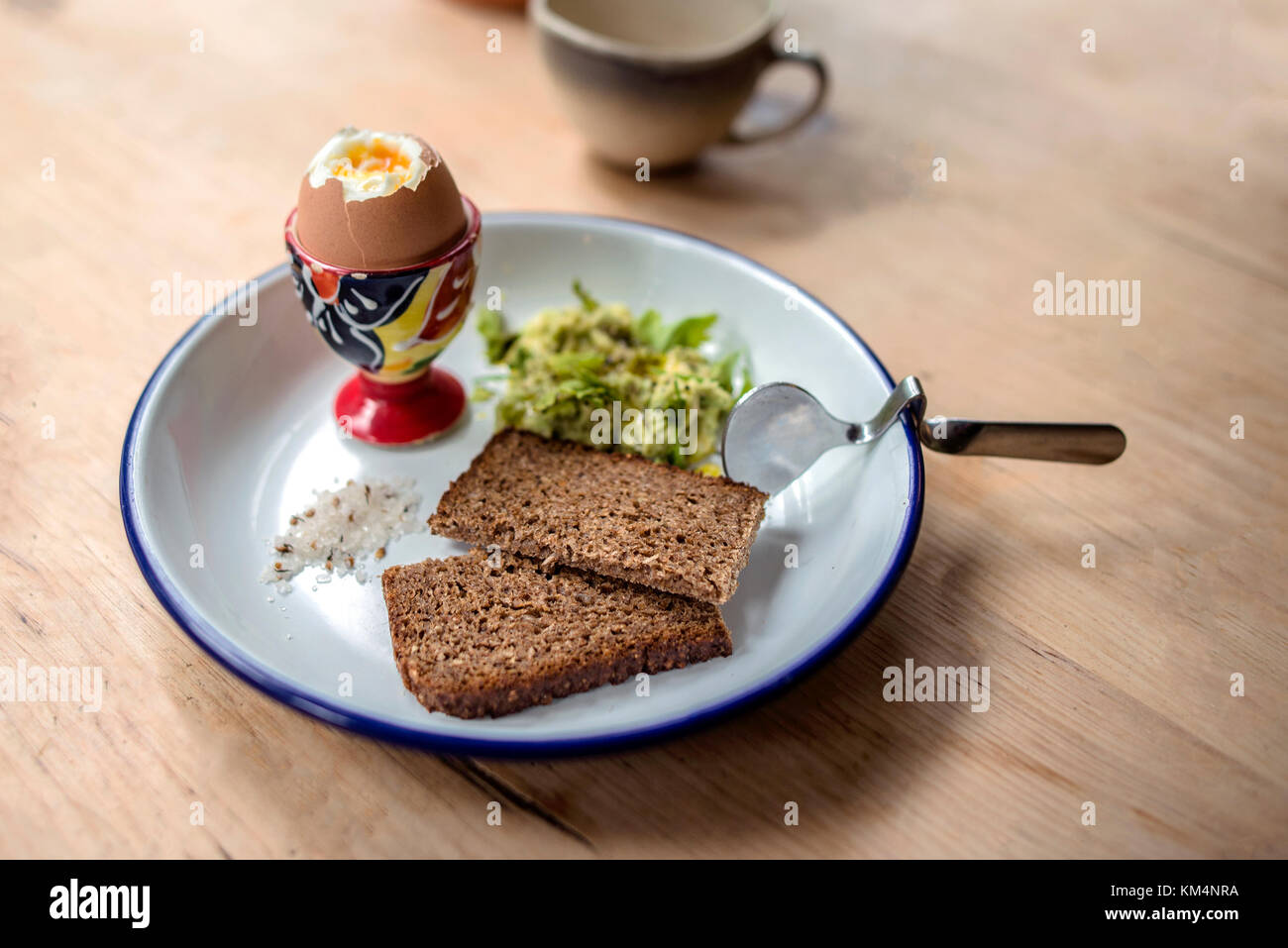 Boiled Egg with Rye Bread and Avocado Stock Photo - Alamy