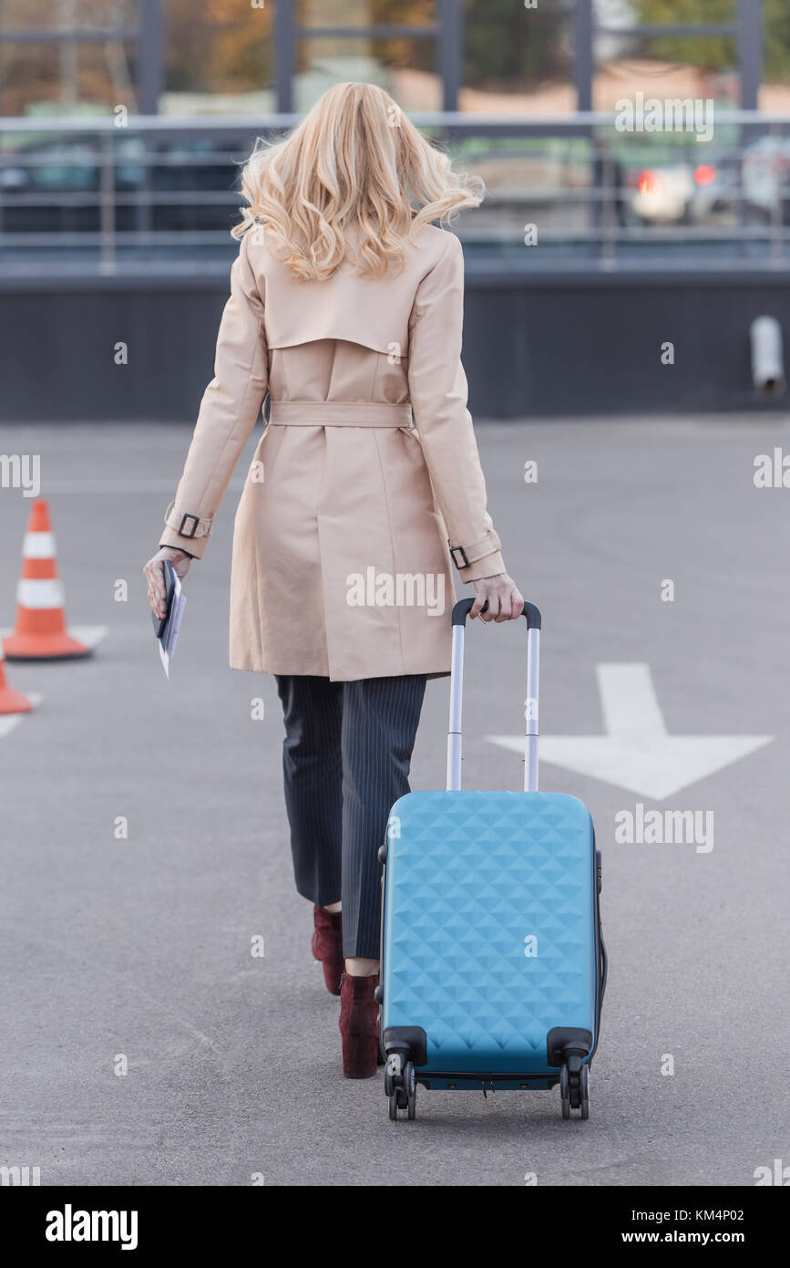 Woman In Trench Coat Back View High Resolution Stock Photography and ...