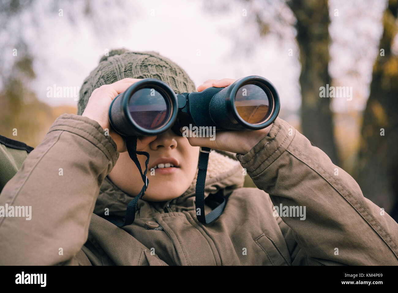 Looking through binoculars journey hi-res stock photography and images ...