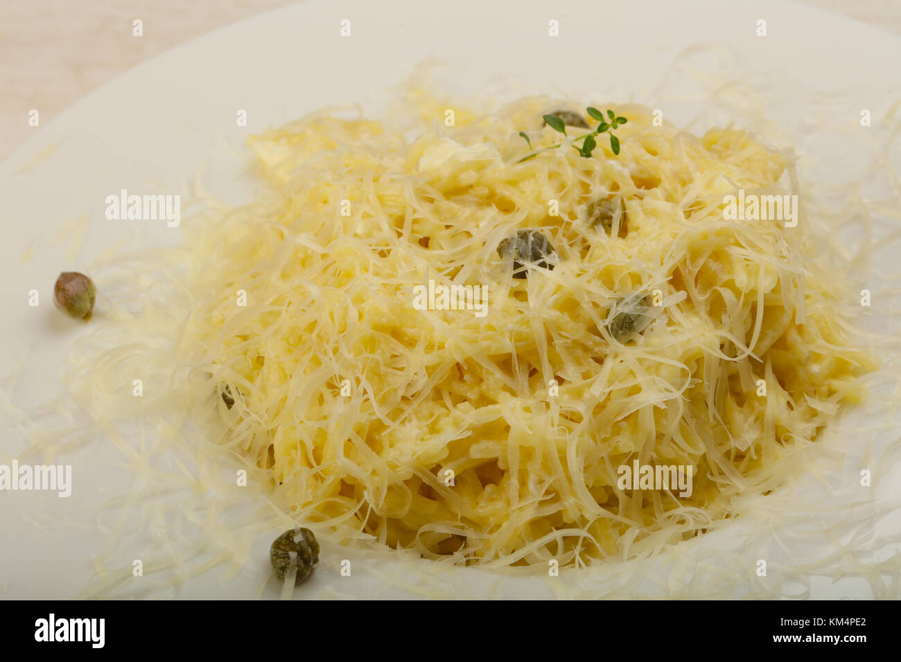 Pasta with soft cheese, parmesan and capers Stock Photo - Alamy
