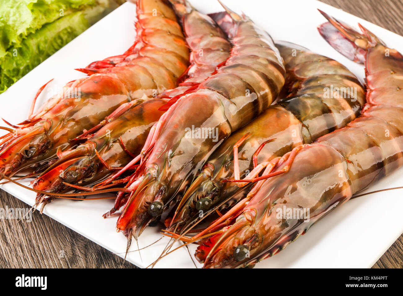 Raw big tiger prawn - ready for cooking Stock Photo - Alamy