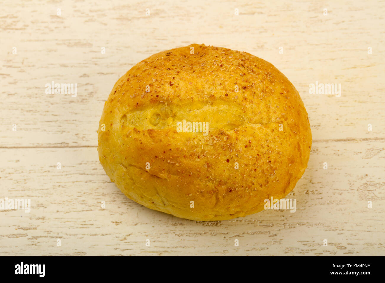 Small bread bun for breakfast over wooden Stock Photo - Alamy