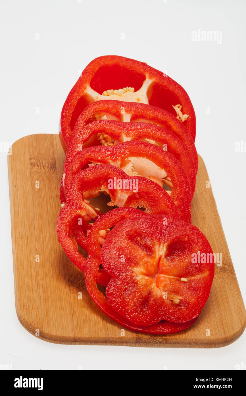 Sliced red pepper isolated on white background Stock Photo - Alamy