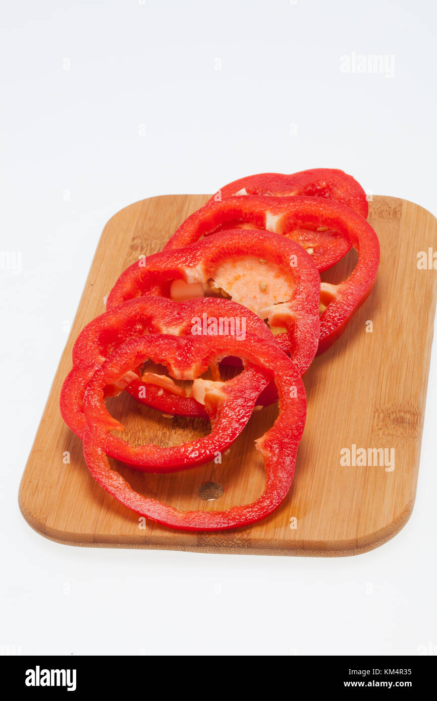 Sliced red pepper isolated on white background Stock Photo - Alamy