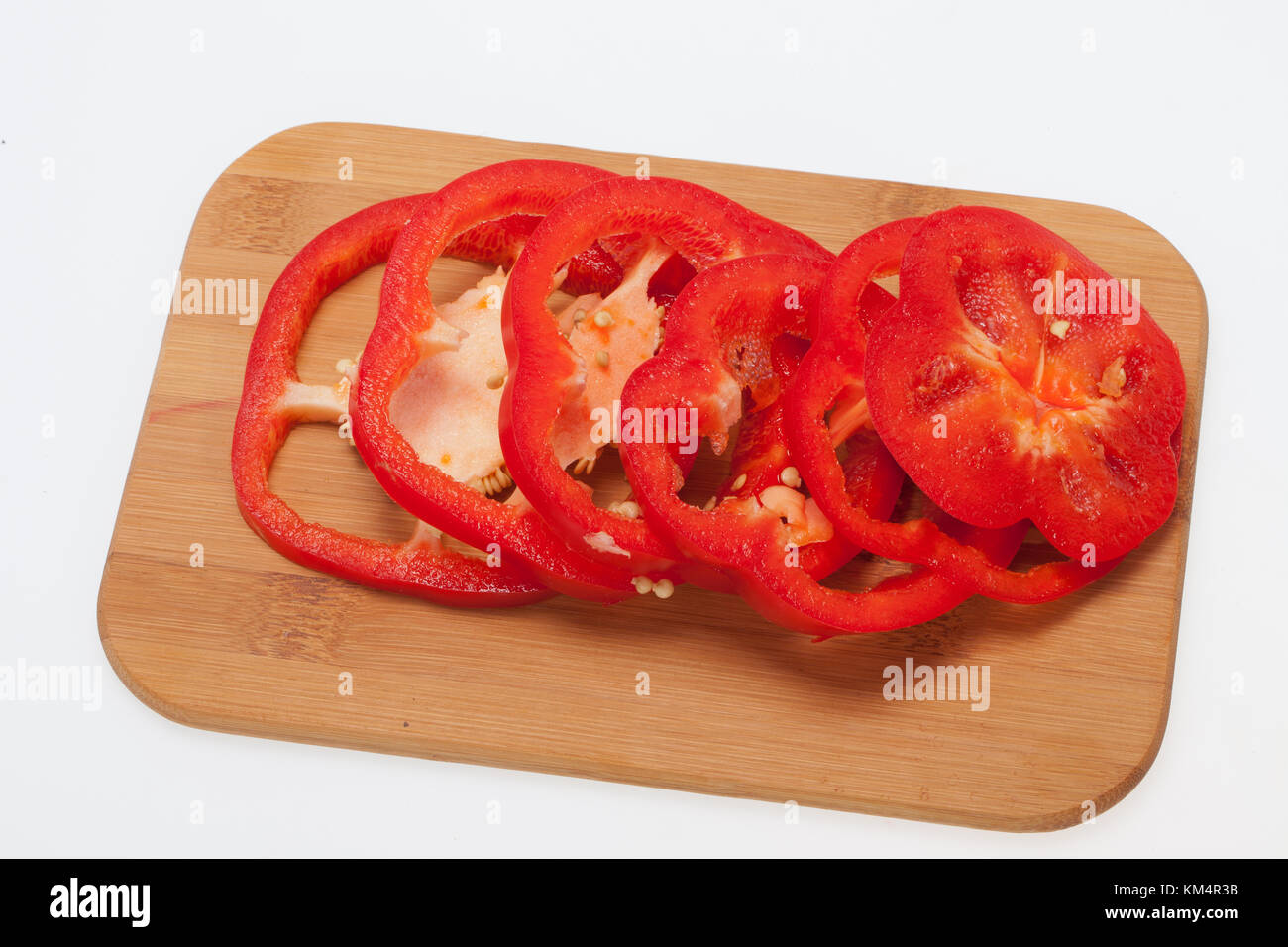 Sliced red pepper isolated on white background Stock Photo - Alamy