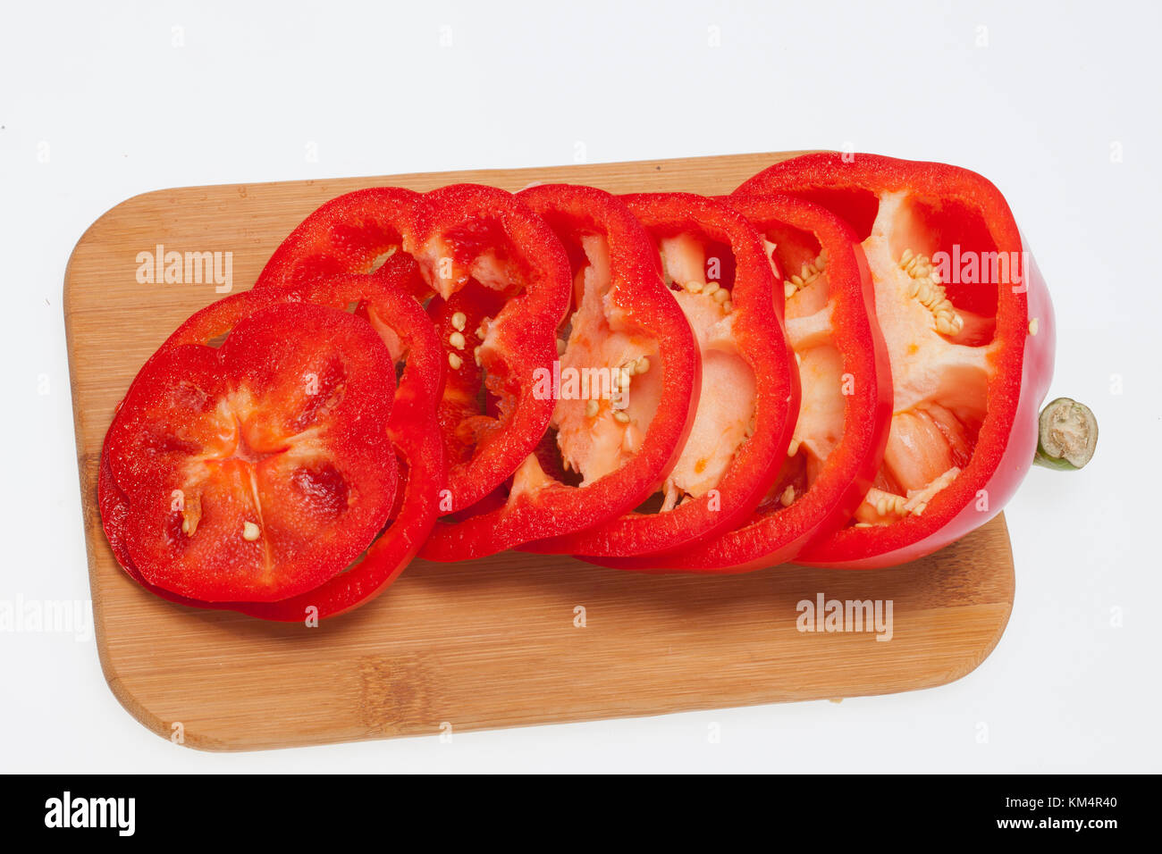 Sliced red pepper isolated on white background Stock Photo - Alamy