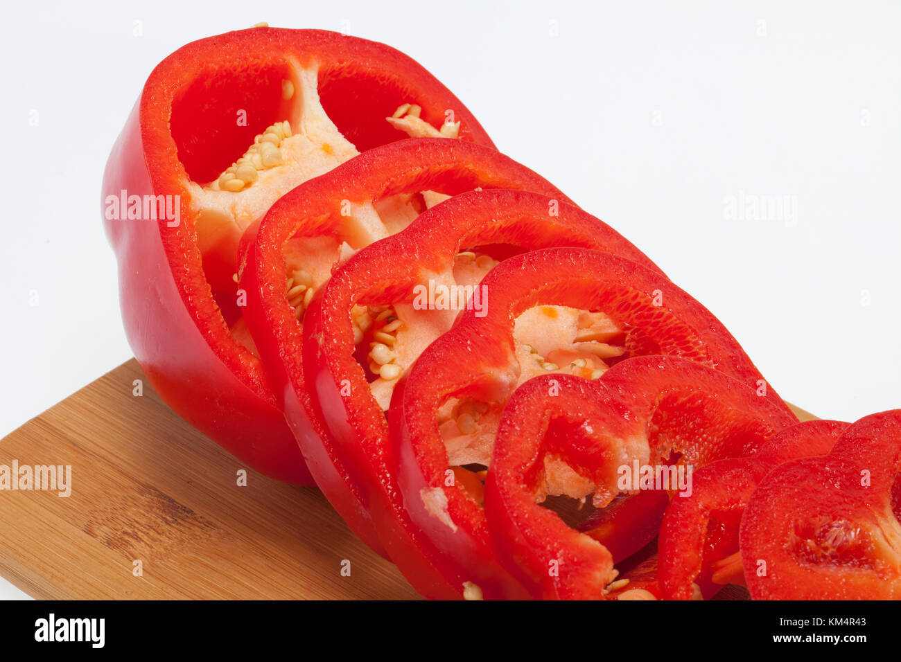 Sliced red pepper isolated on white background Stock Photo - Alamy