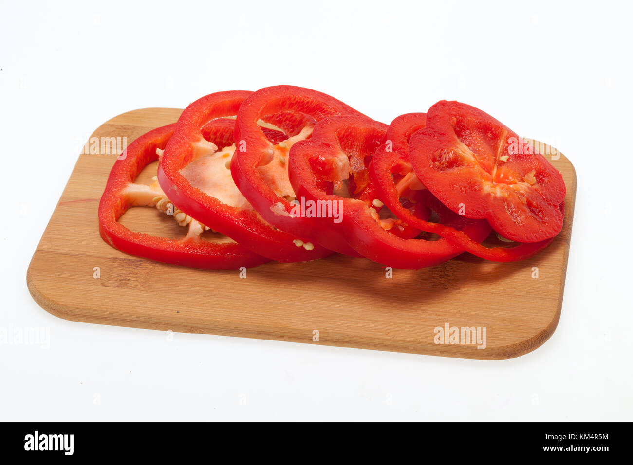 Sliced red pepper isolated on white background Stock Photo - Alamy