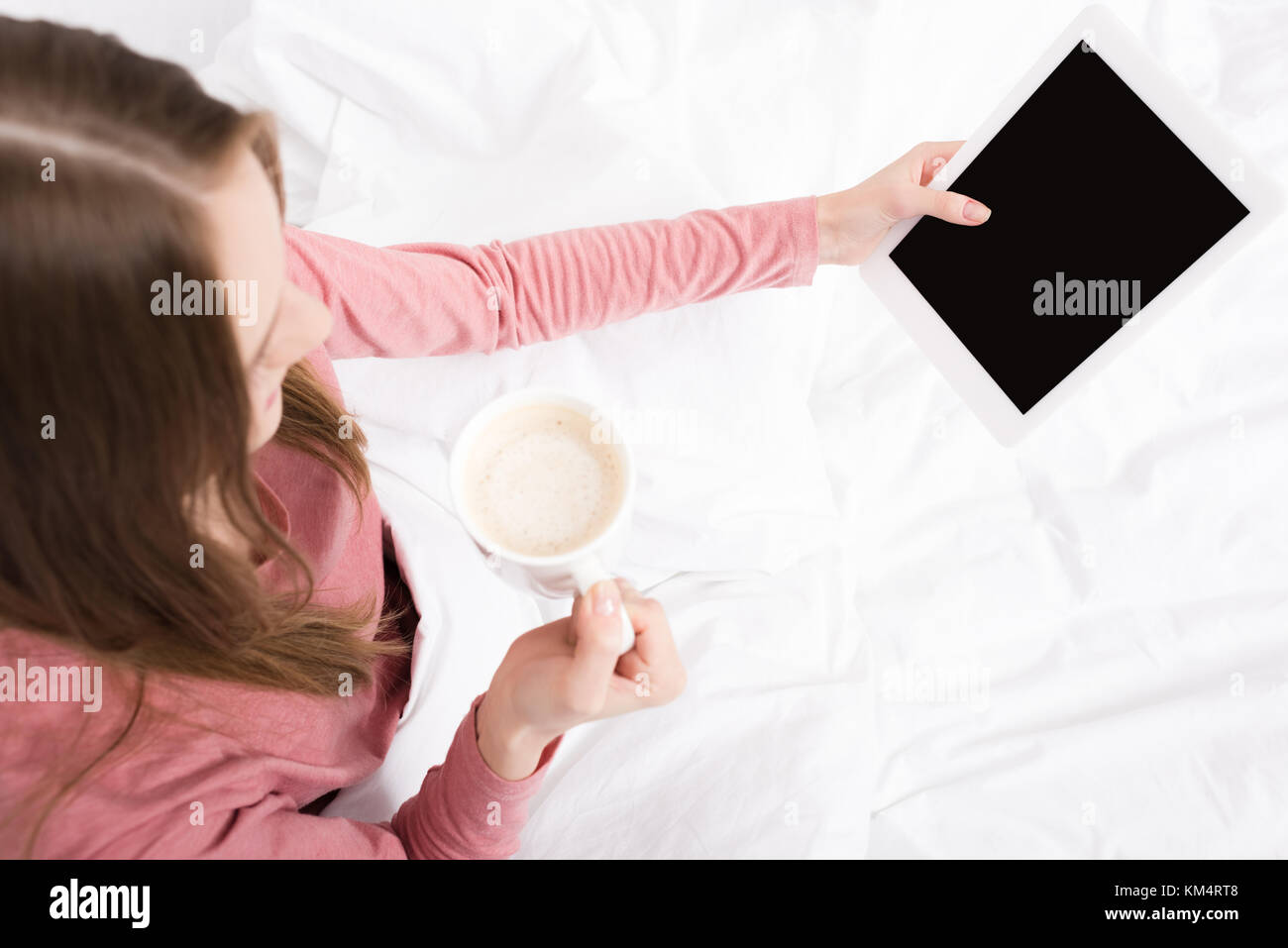 woman with coffee and tablet Stock Photo - Alamy