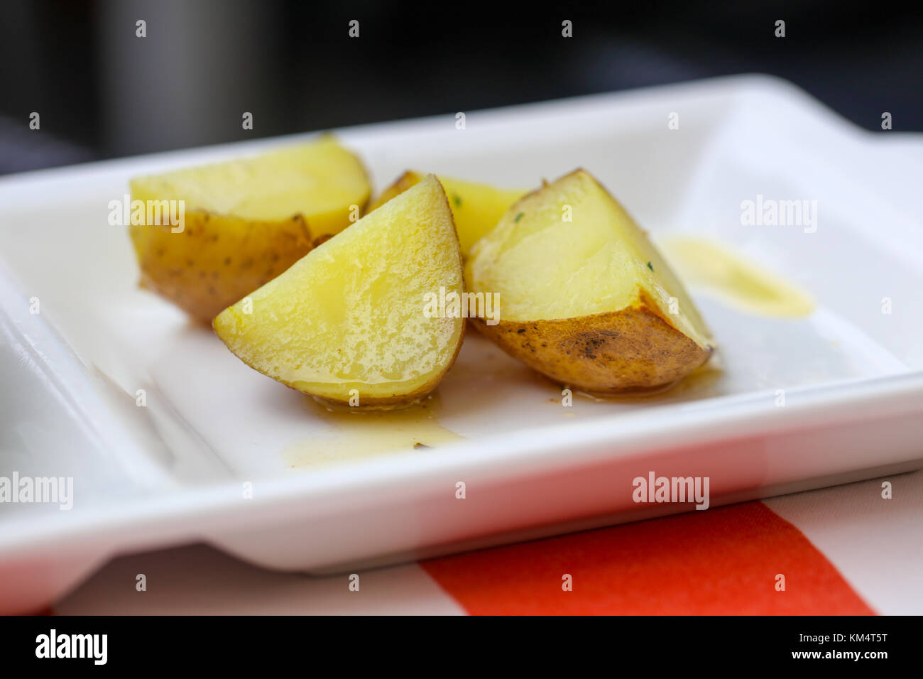 Boiled potato with oil Stock Photo - Alamy
