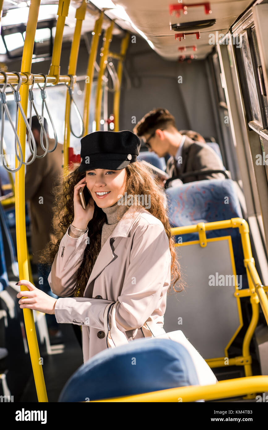 girl using smartphone in bus Stock Photo - Alamy